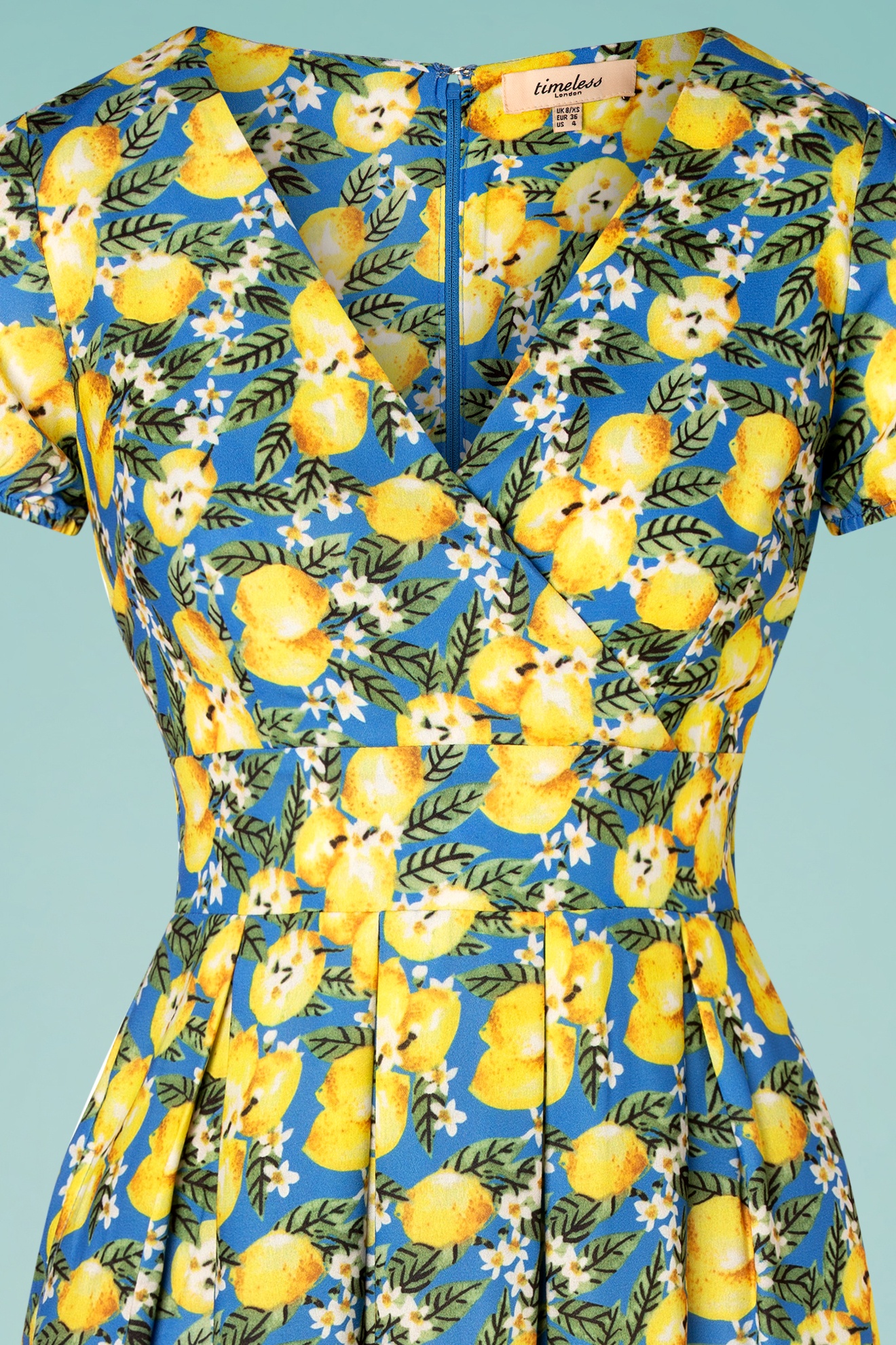 Timeless 50s Fin Lemon Swing Dress in Blue | Shop at Topvintage