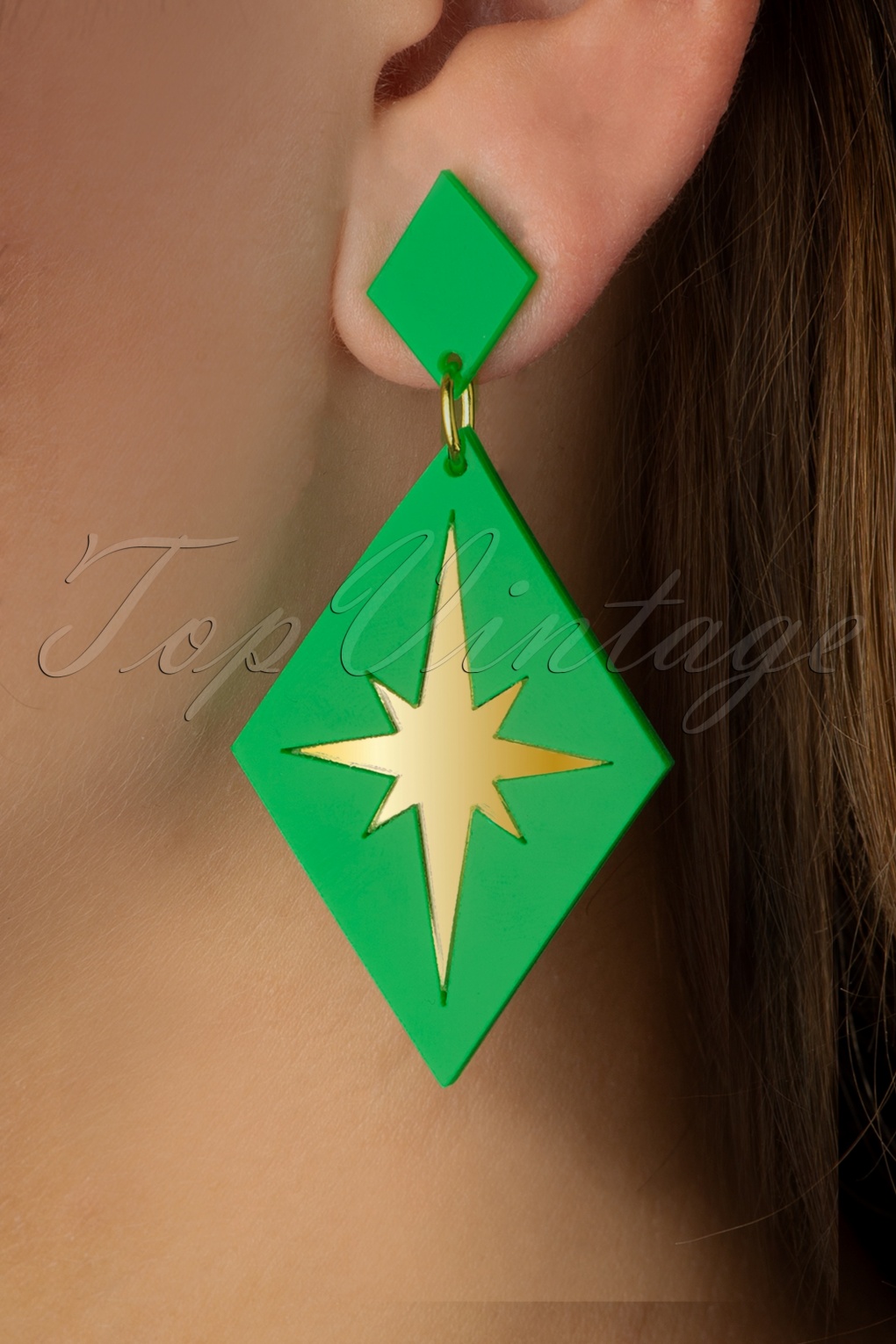Glitz-o-Matic 50s Starburst Earrings in Green | Shop at Topvintage